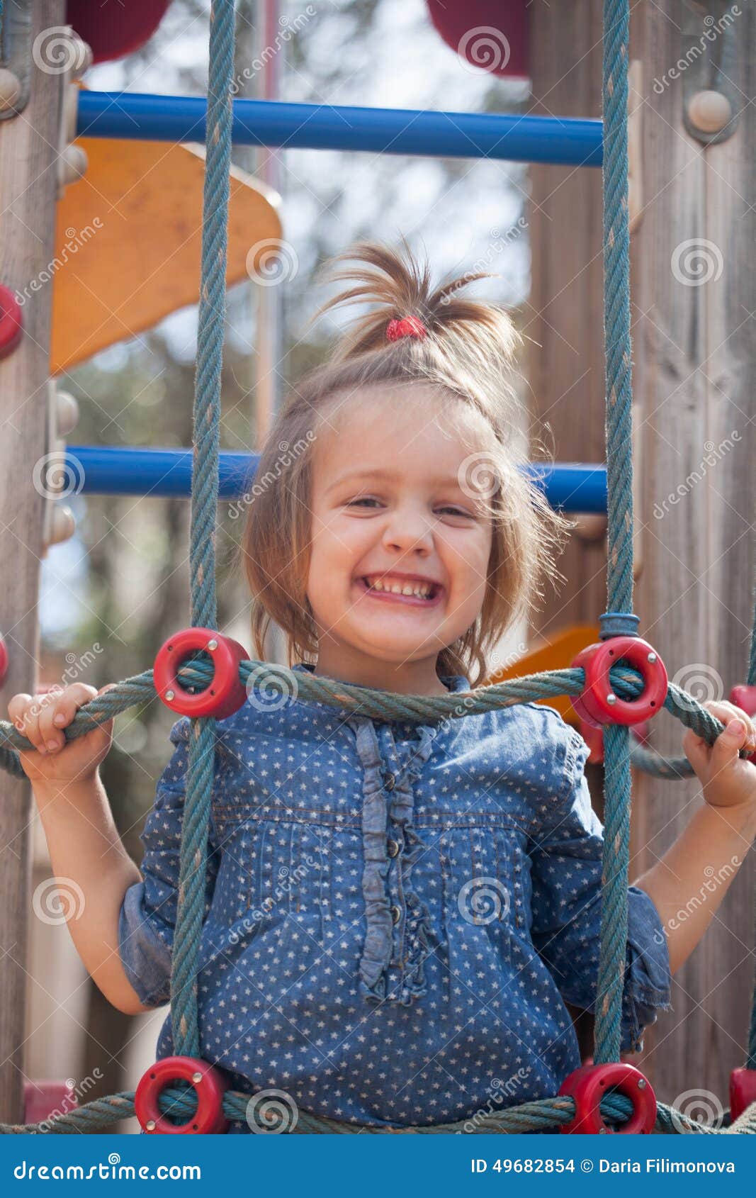 Girl Climbing the Ropes of Challenge Net Stock Photo - Image of kids ...
