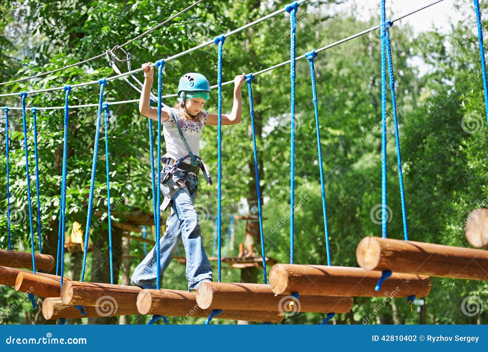 Girl is Climbing To High Rope Structures Stock Photo - Image of pulley ...