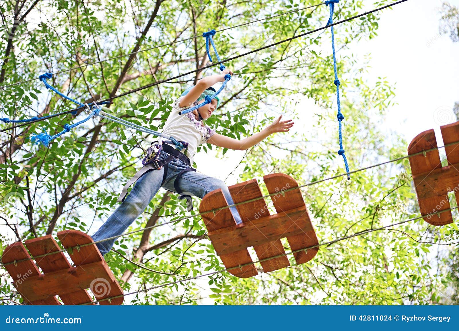 Girl is Climbing To High Rope Structures Stock Photo - Image of ...