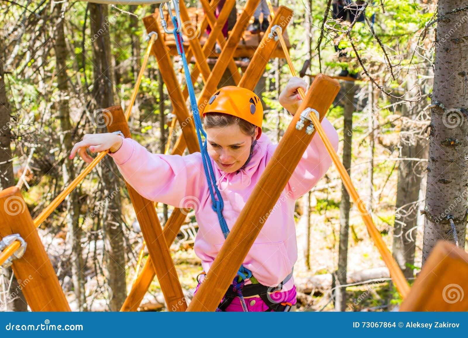 Girl Climbs into Ropes Course Stock Photo - Image of obstacle, action ...