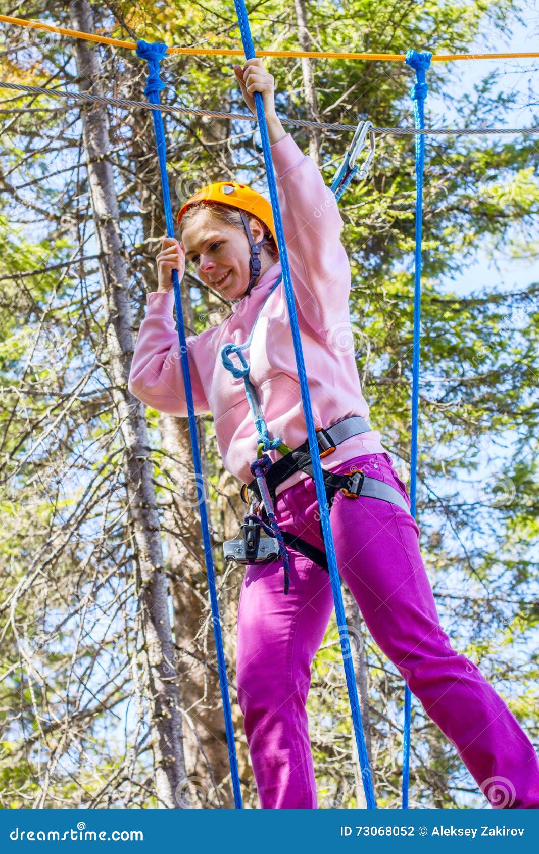Girl Climbs into Ropes Course Stock Photo - Image of holiday ...