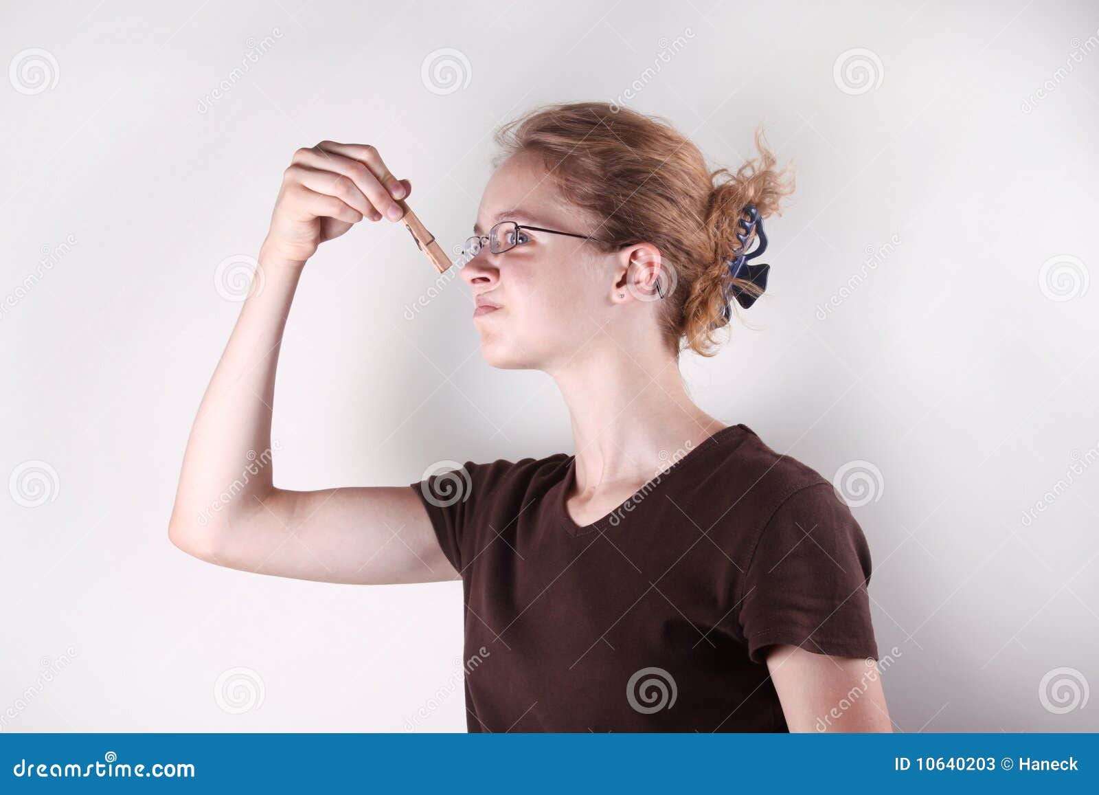 Girl with Clothespin stock image. Image of pinching, clothes - 10640203