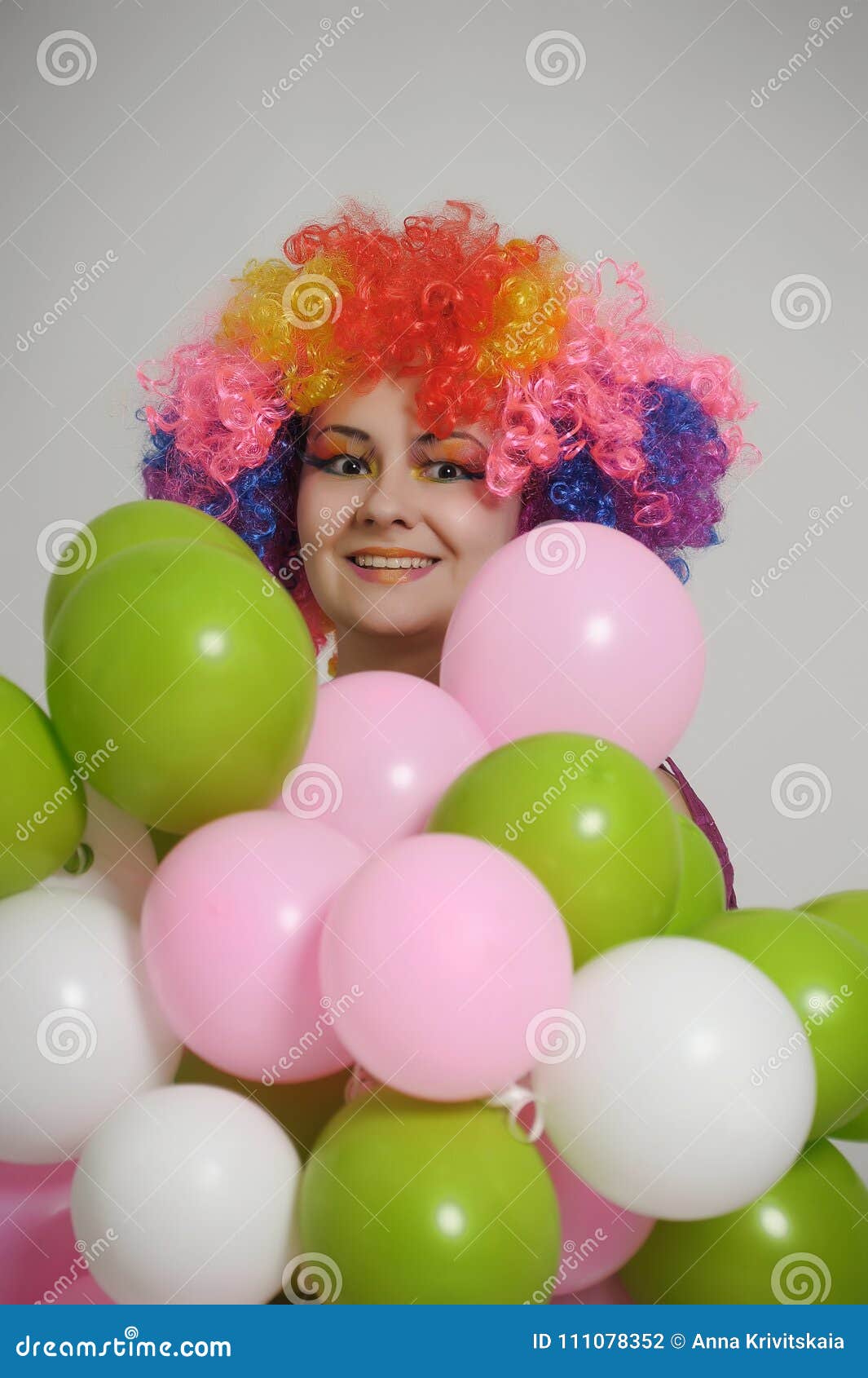 Girl in Clown Wig with Balloons Stock Photo - Image of comic, beauty ...