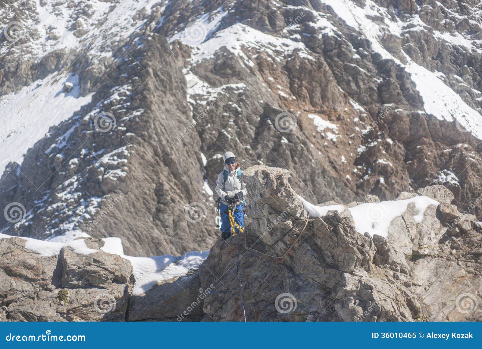 Girl clumb up on the ice stock image. Image of exercising - 36010465
