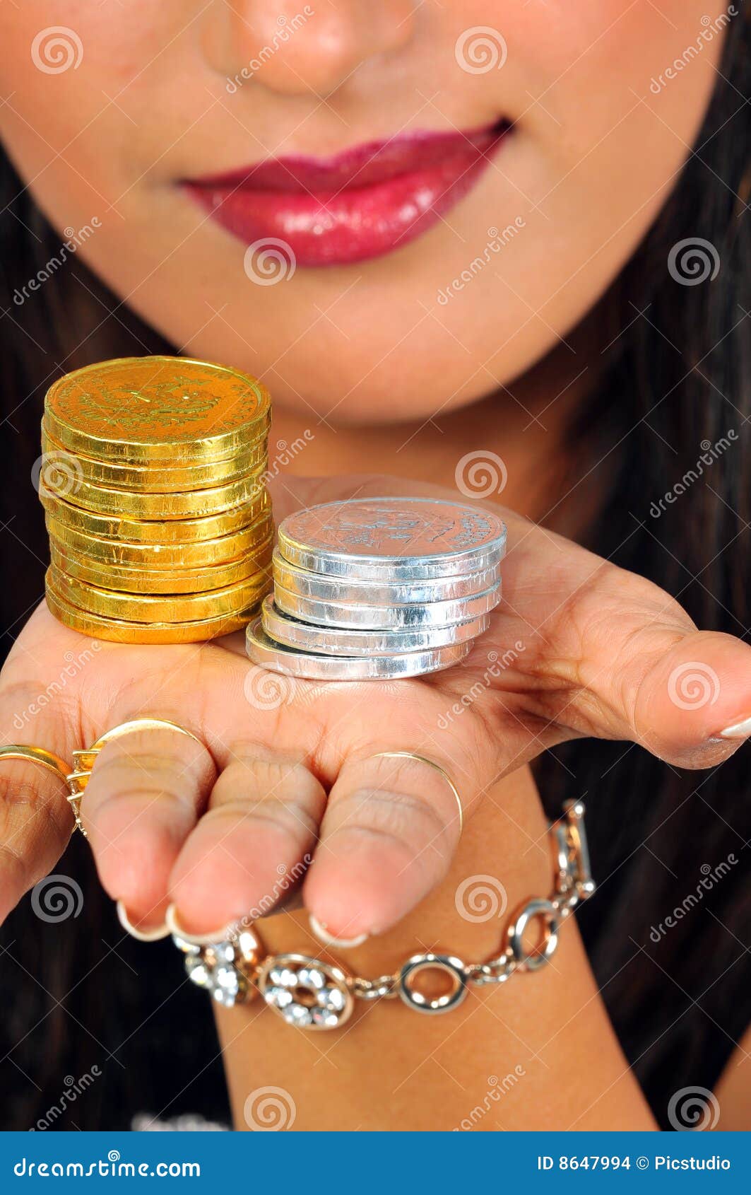 Girl with coins stock photo. Image of eyes, pose, heap - 8647994