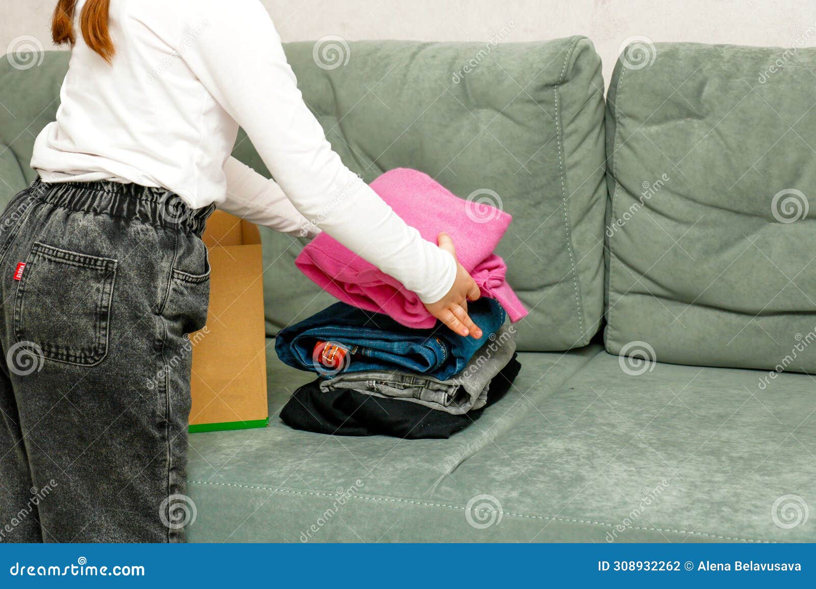 Girl Collecting Clothes in a Donation Box Stock Photo - Image of ...