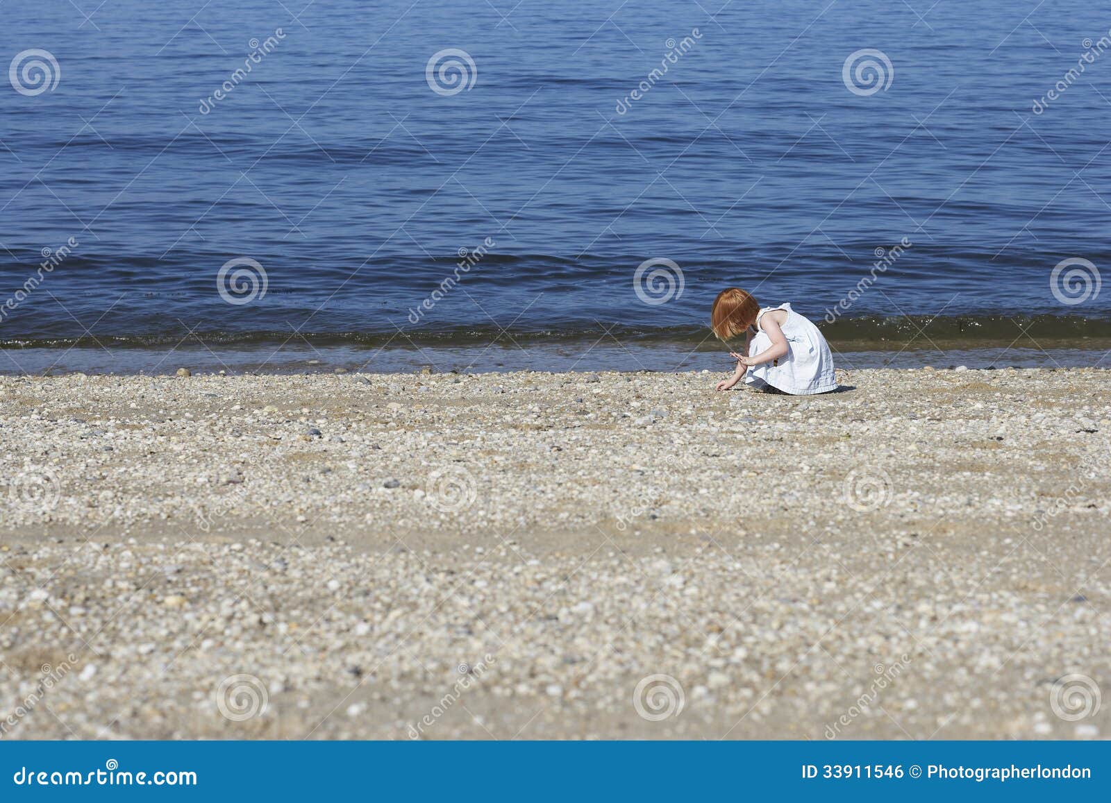 Girl Collecting Shells Beach Stock Photos - Download 177 Royalty Free ...