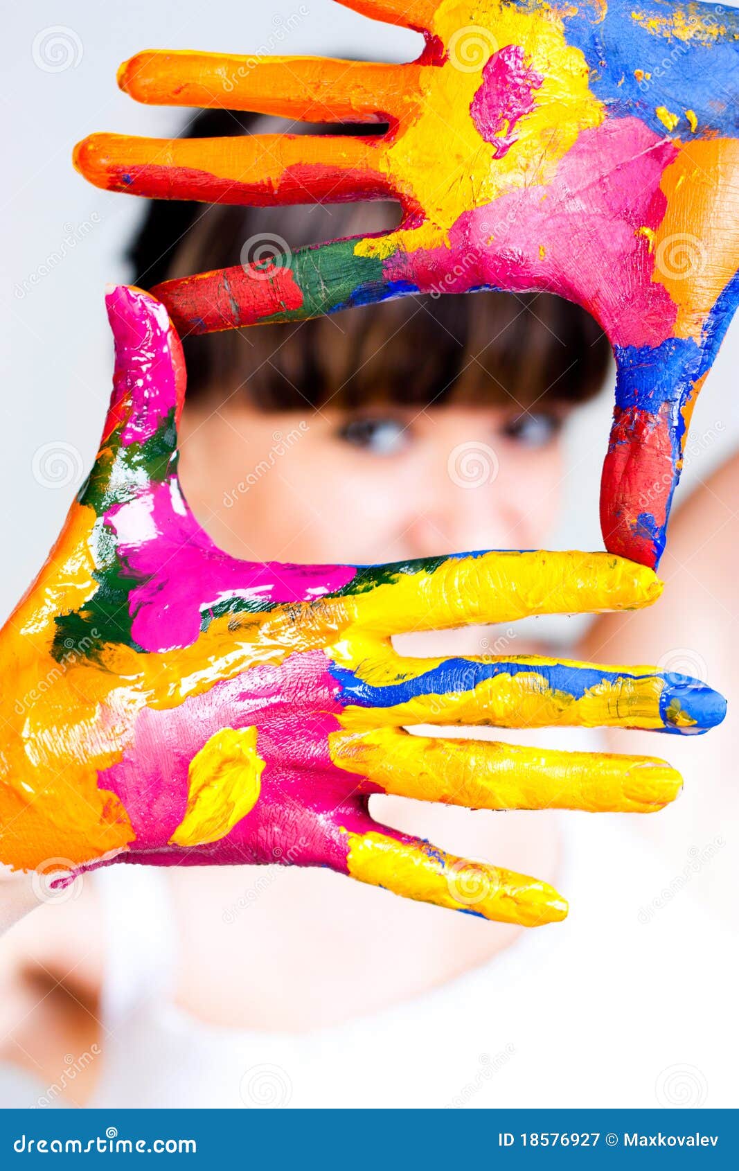 A girl with colored hands stock image. Image of friendship - 18576927