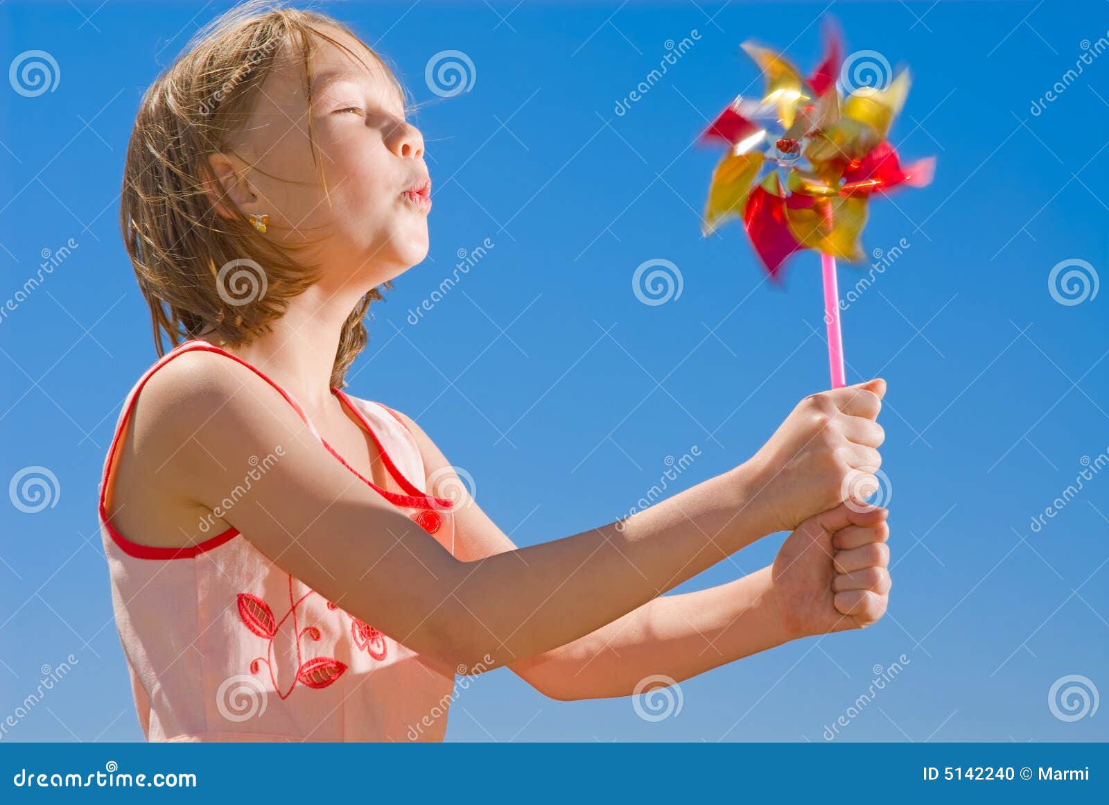 Girl with colored pinwheel stock photo. Image of relaxation - 5142240