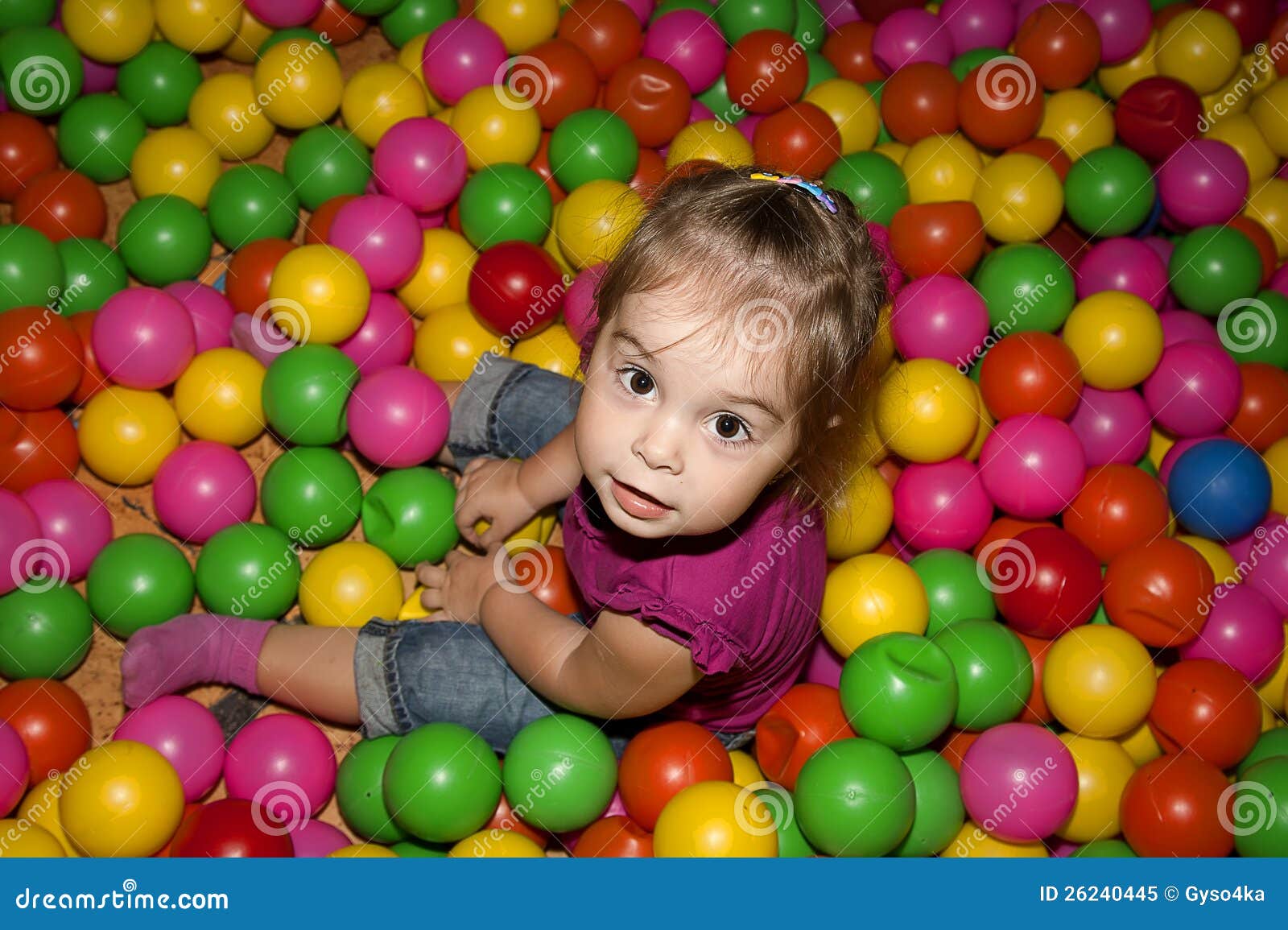 Girl with colorful balls stock image. Image of people - 26240445