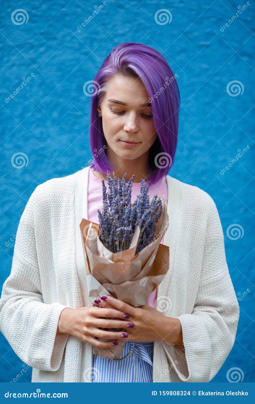 Girl With Colourfull Purple Hair Holding A Lavender Bouquet In Her