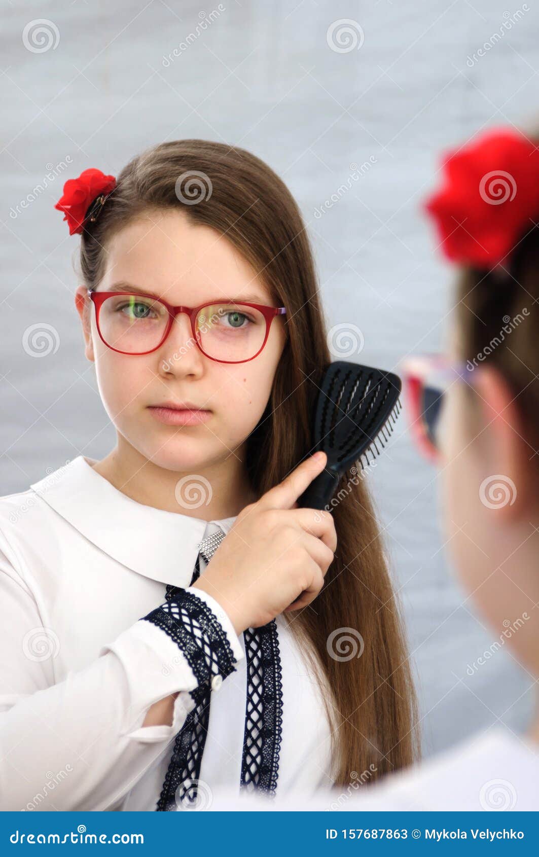 Girl with comb stock image. Image of girl, beauty, mirror - 157687863