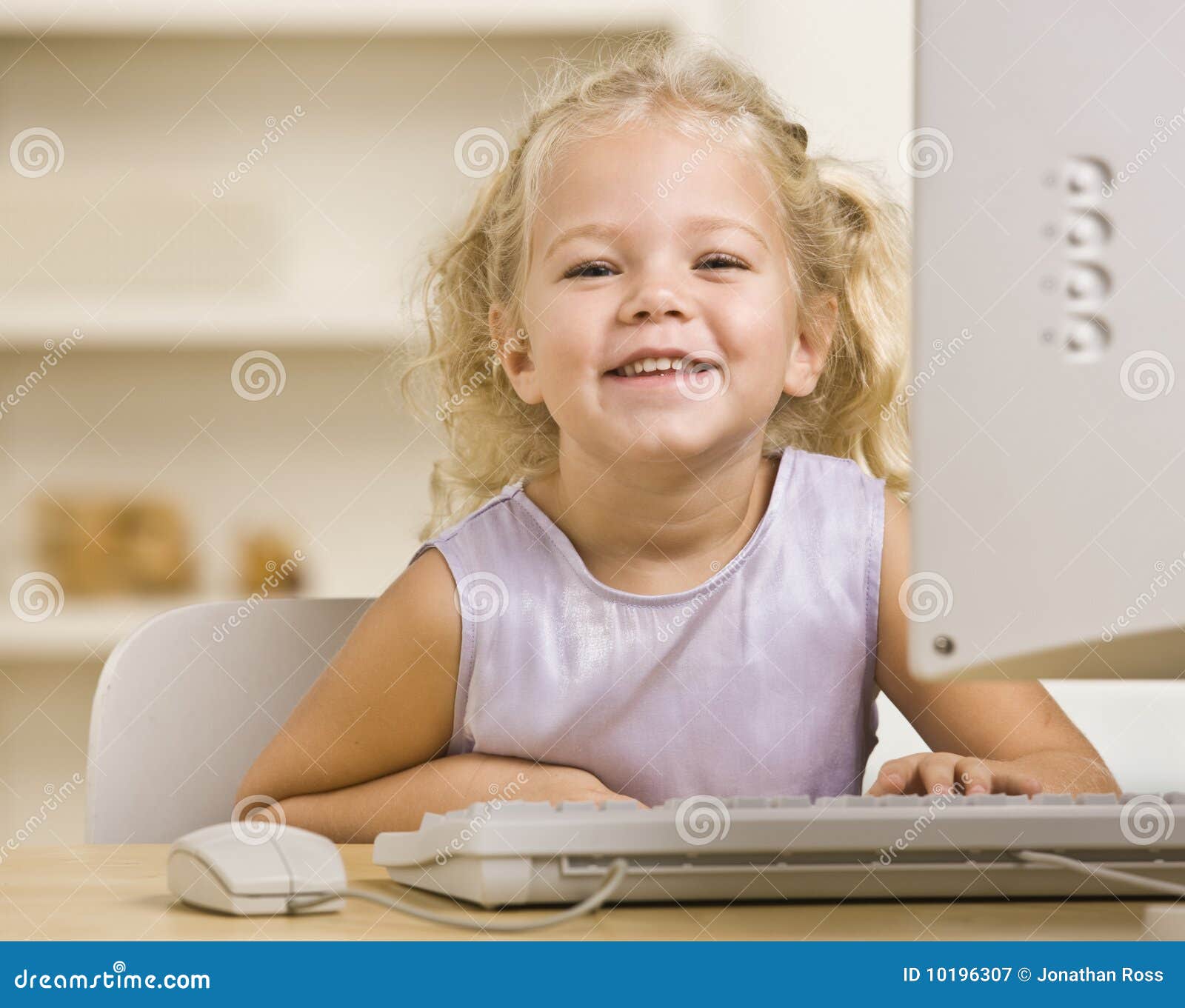 Girl on Computer stock image. Image of seated, female - 10196307