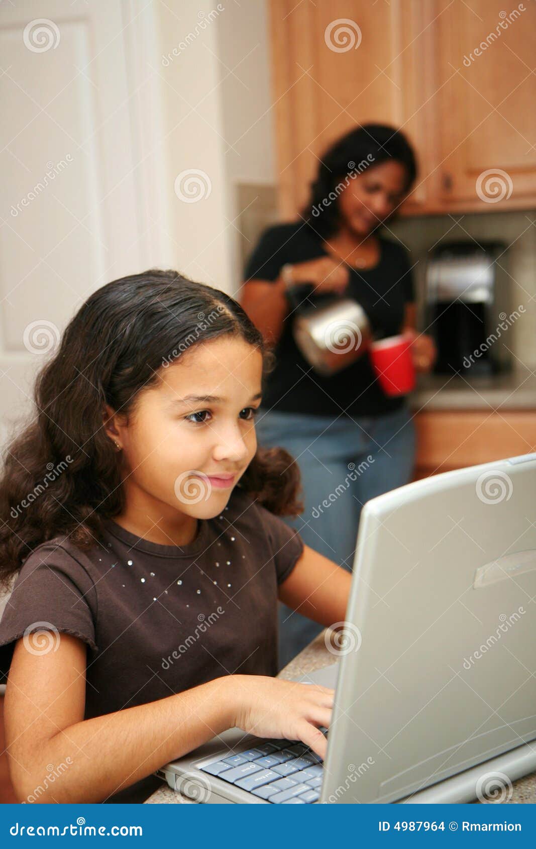 Girl on computer stock photo. Image of homework, mixed - 4987964