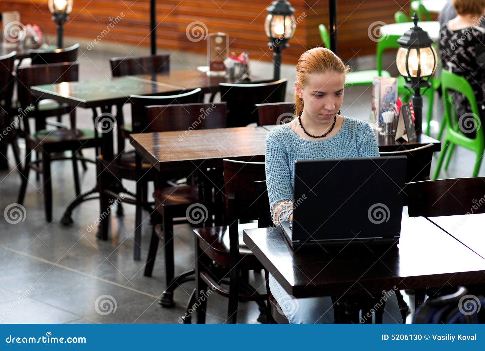 Girl with computer in cafe stock photo. Image of internet - 5206130