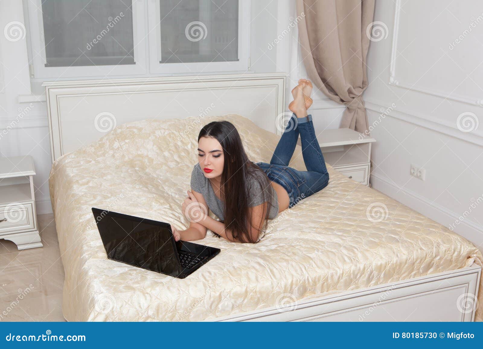 Girl with a Computer at Home. Stock Photo - Image of happy, hair: 80185730