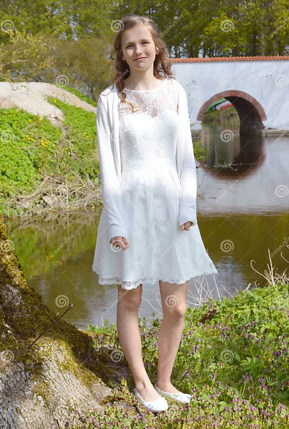 Confirmation stock photo. Image of nice, grass, girl - 100593678