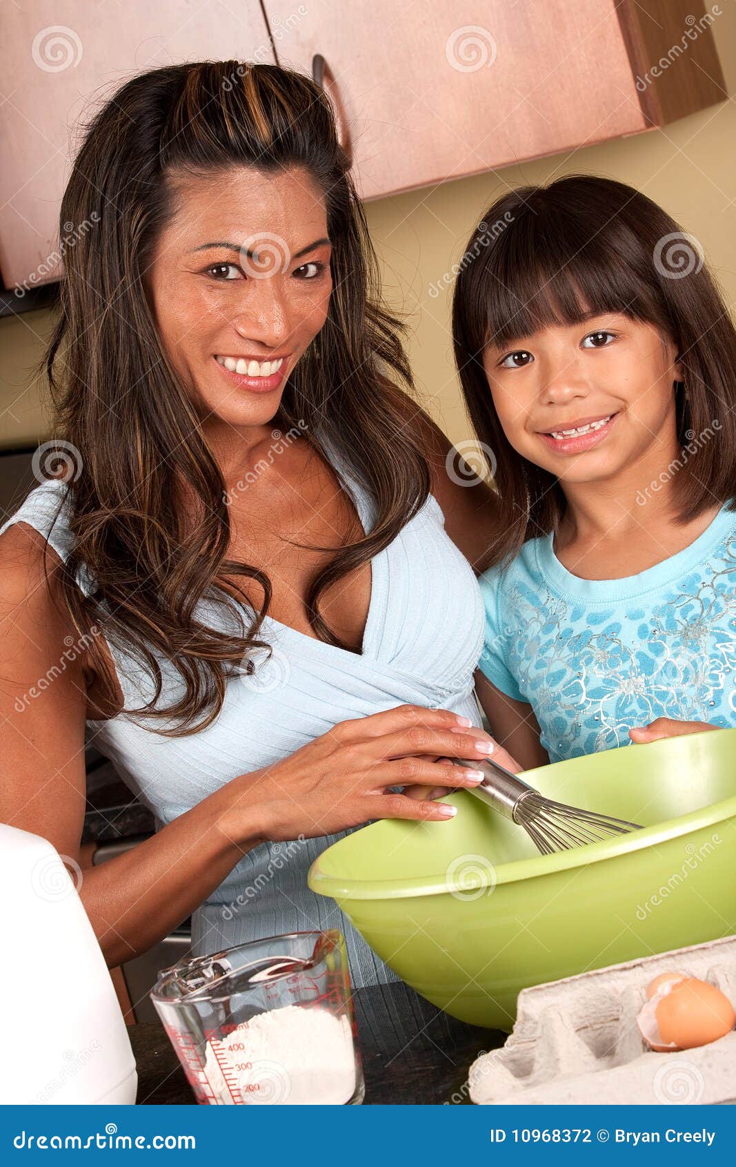 Girl cooking in kitchen stock photo. Image of family - 10968372