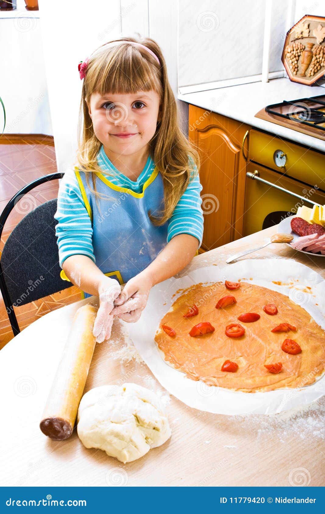 Girl cooking pizza stock photo. Image of bakery, blond - 11779420