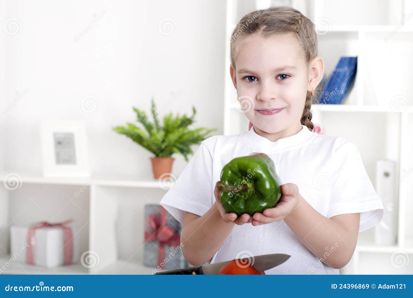 Girl cooking vegetables stock image. Image of healthy - 24396869