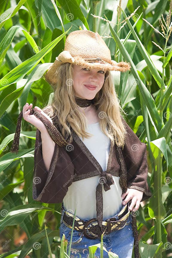 Girl in corn stock image. Image of green, female, happy - 10847373