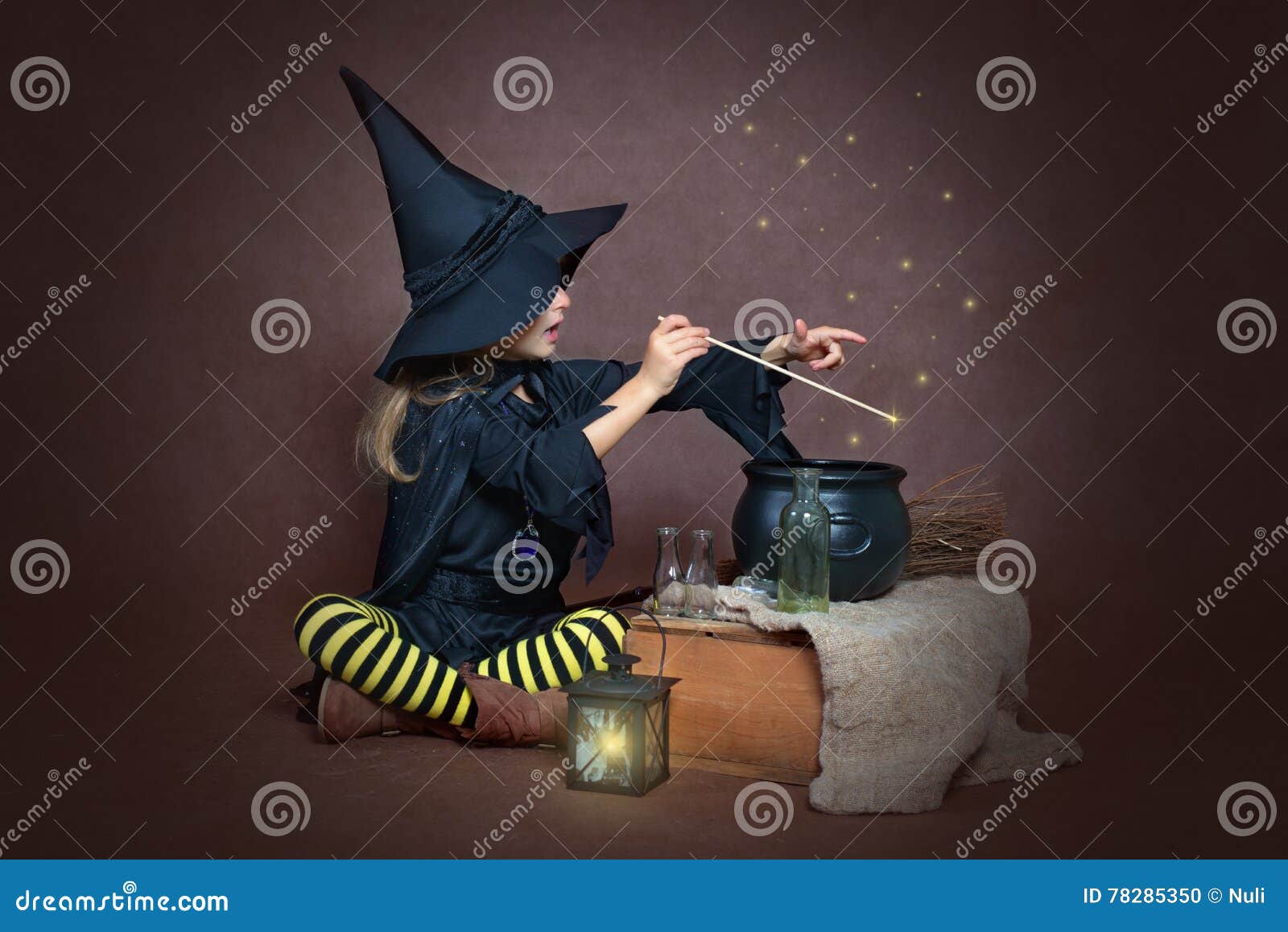 Girl in a Costume of Witch Making Magic Potion Stock Photo - Image of ...