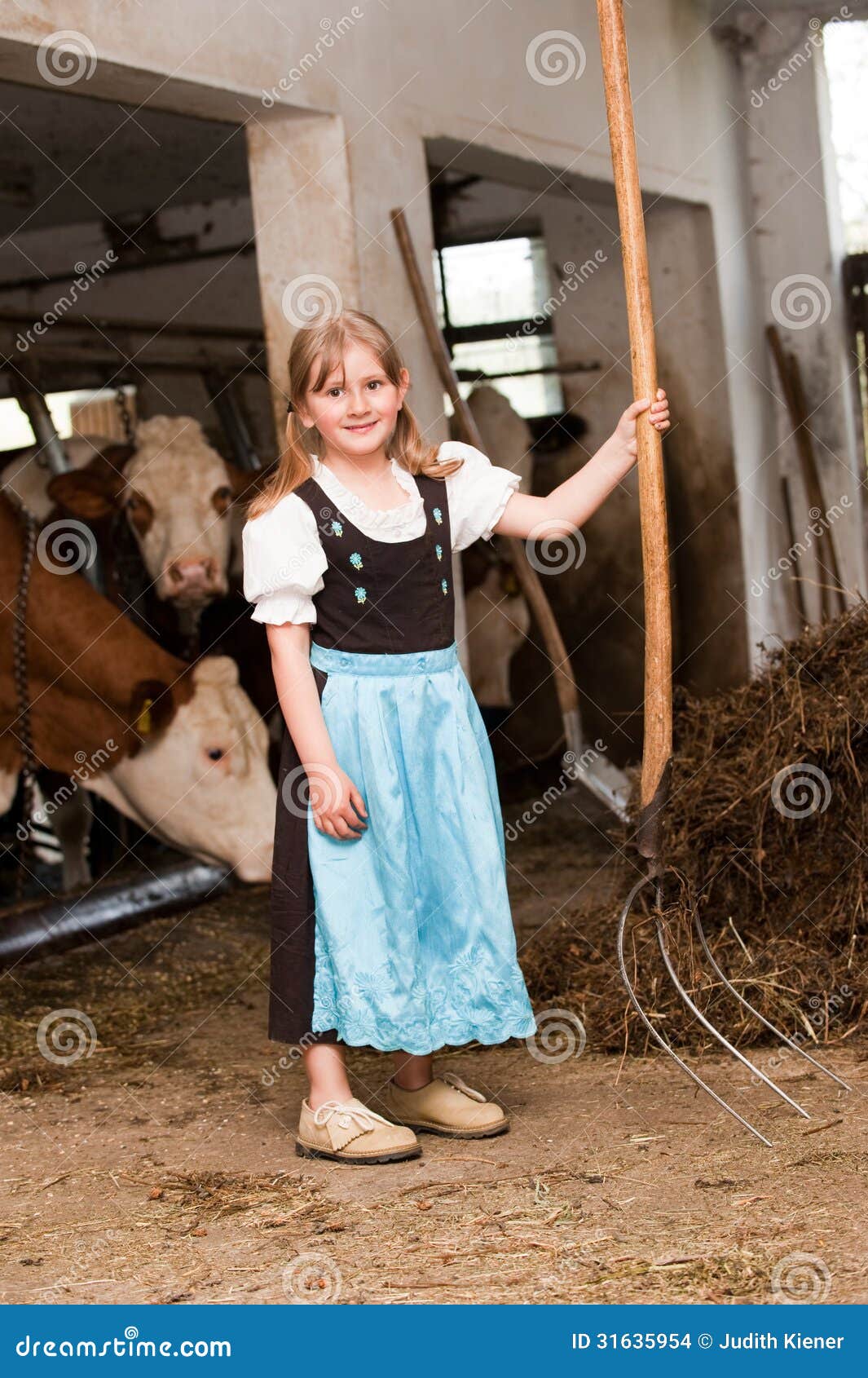 Girl in a cow stable stock photo. Image of costume, happy - 31635954