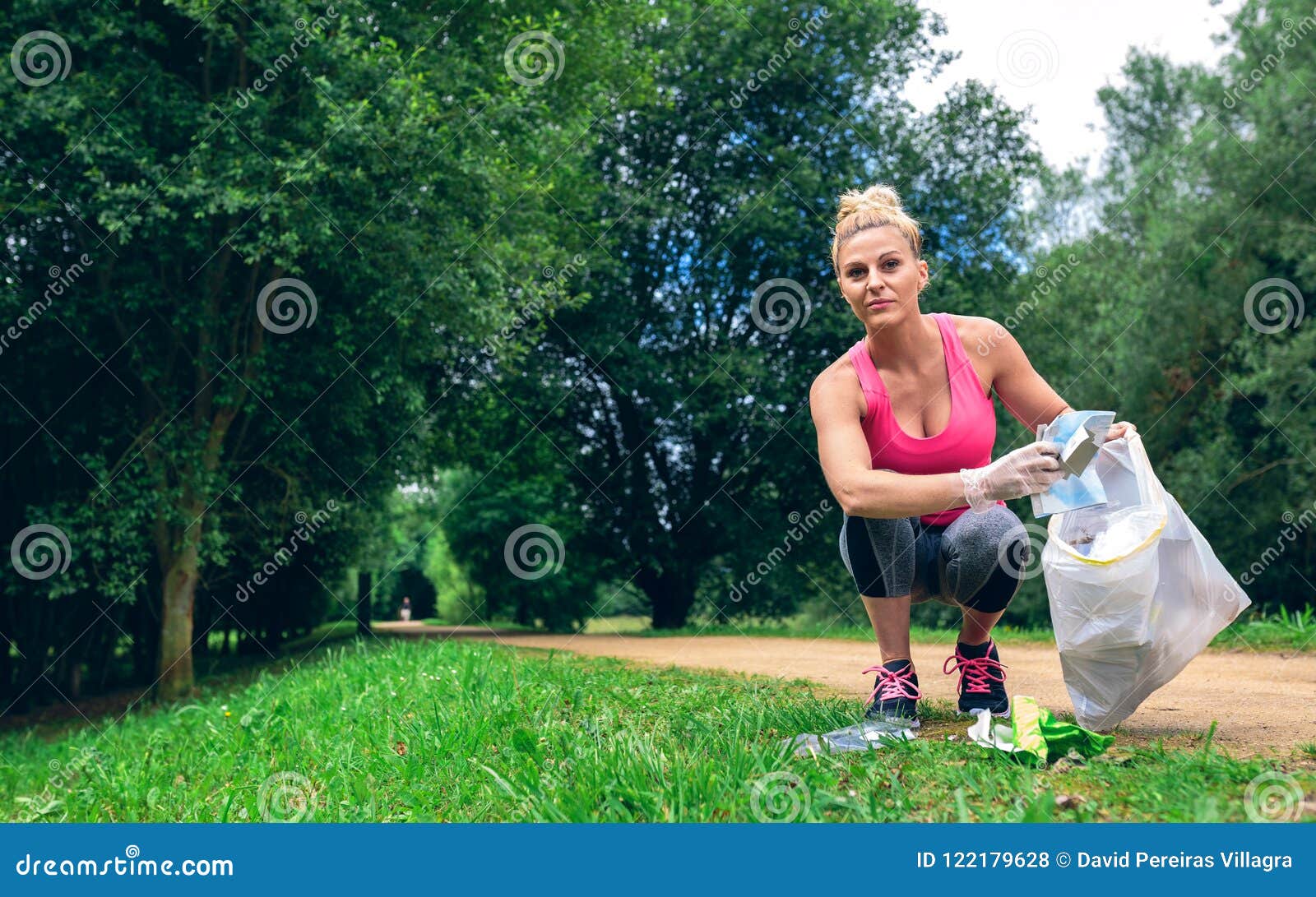Girl Picking Up Trash Doing Plogging Stock Photo - Image of people ...