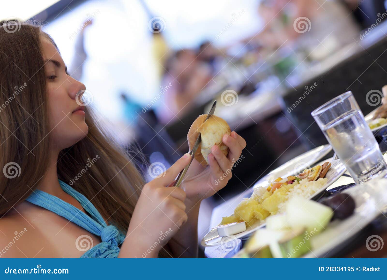 Girl cutting bun stock image. Image of cute, bread, color - 28334195