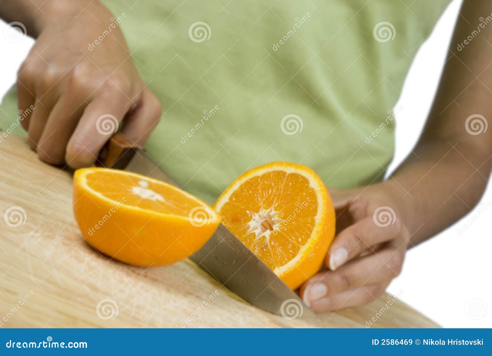 Girl cutting orange stock image. Image of drink, hungry - 2586469