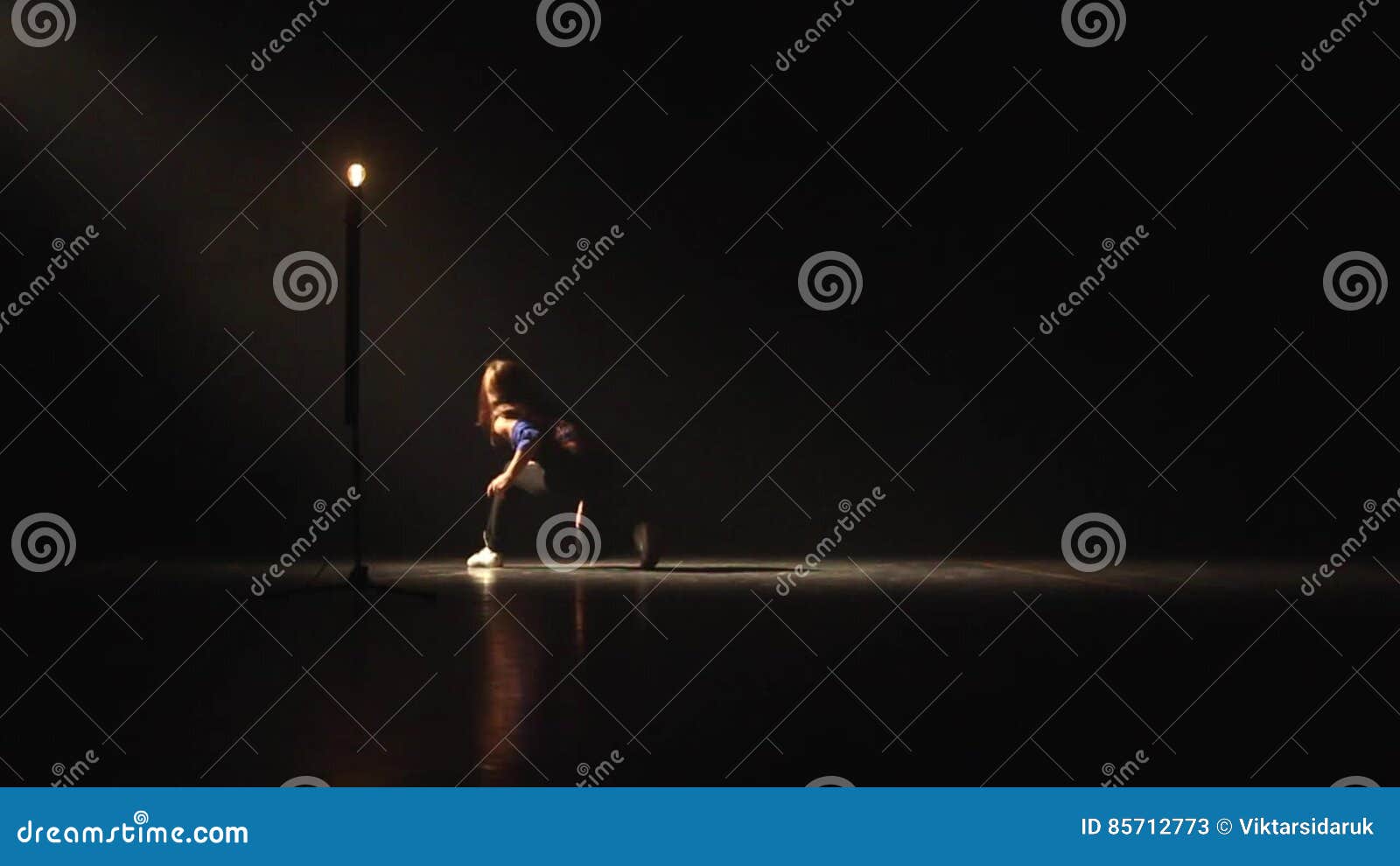 Girl Dancing in the Dark with a Light Bulb. Stock Video - Video of ...