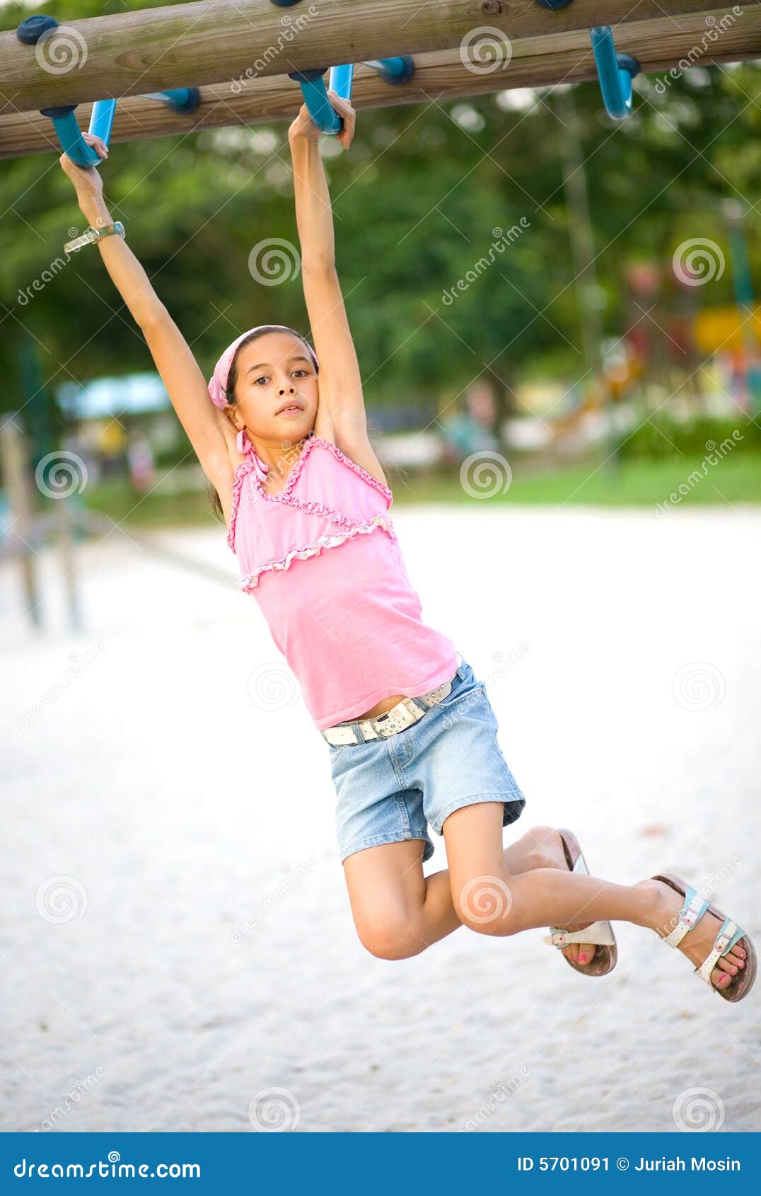 Girl Dangling on Playground Swing Stock Image - Image of expression ...