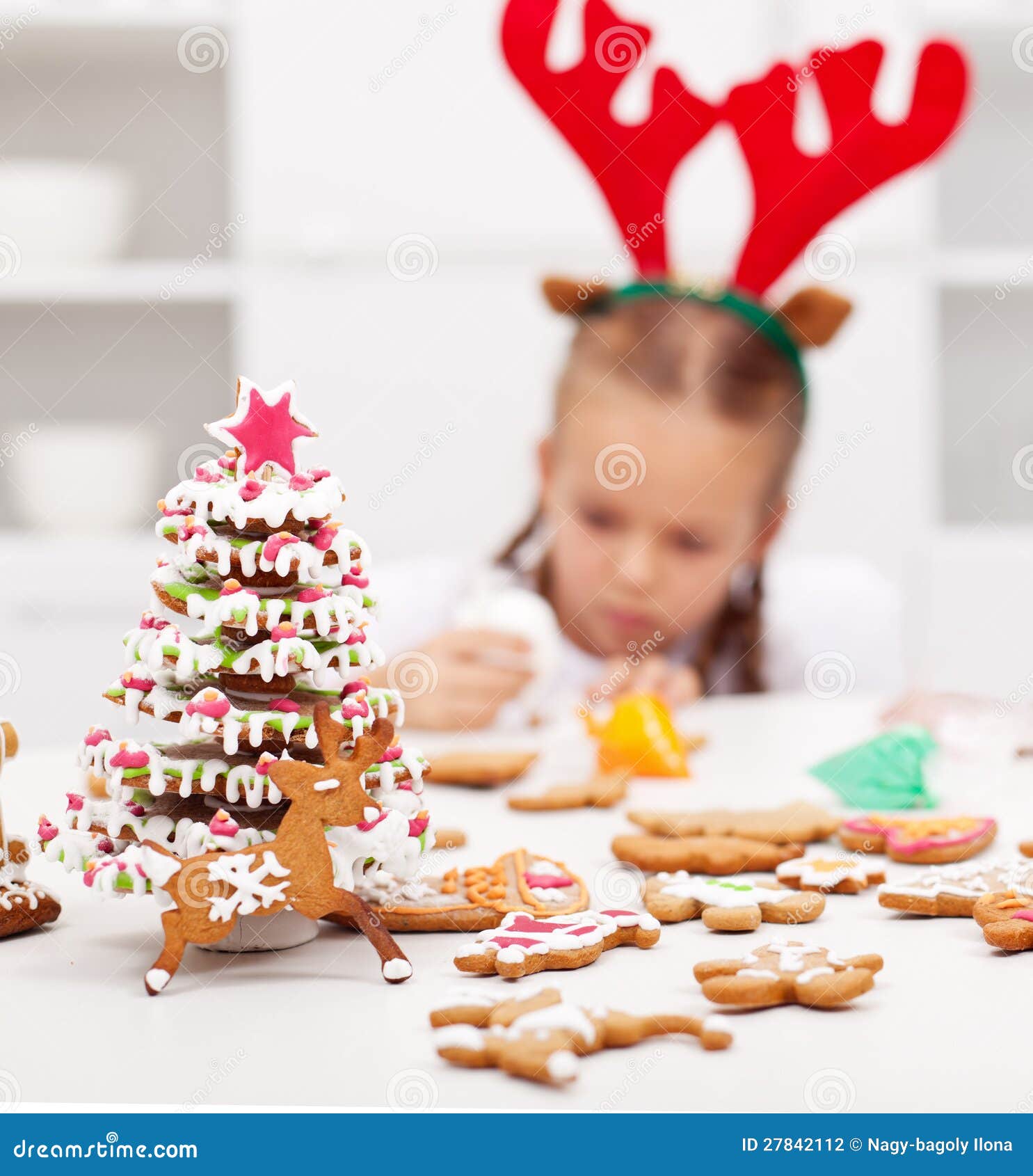 Girl Decorating Gingerbread Cookies Stock Photo - Image of joyful ...
