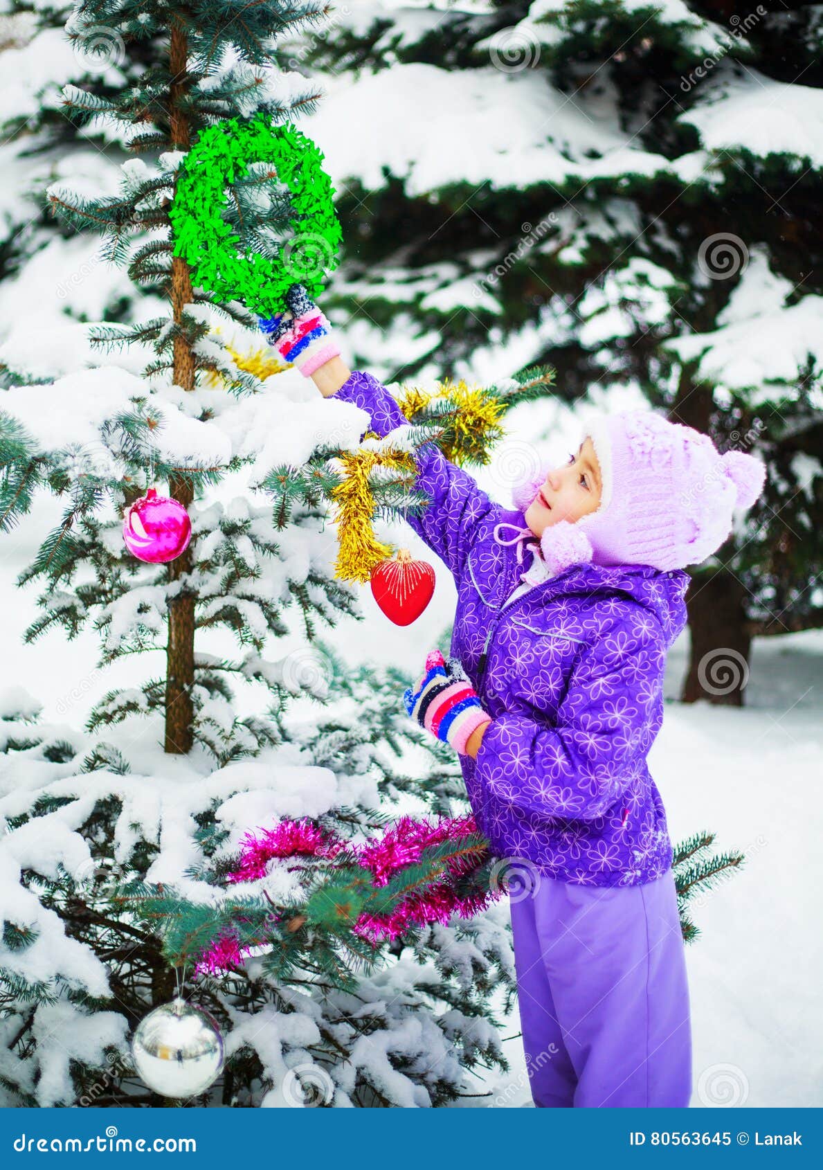 Girl decorating tree stock image. Image of person, casual - 80563645