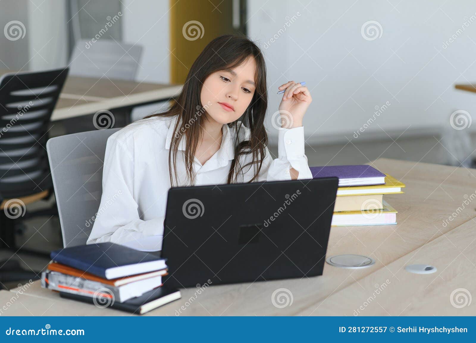 Girl at the desk in school stock image. Image of pupil - 281272557