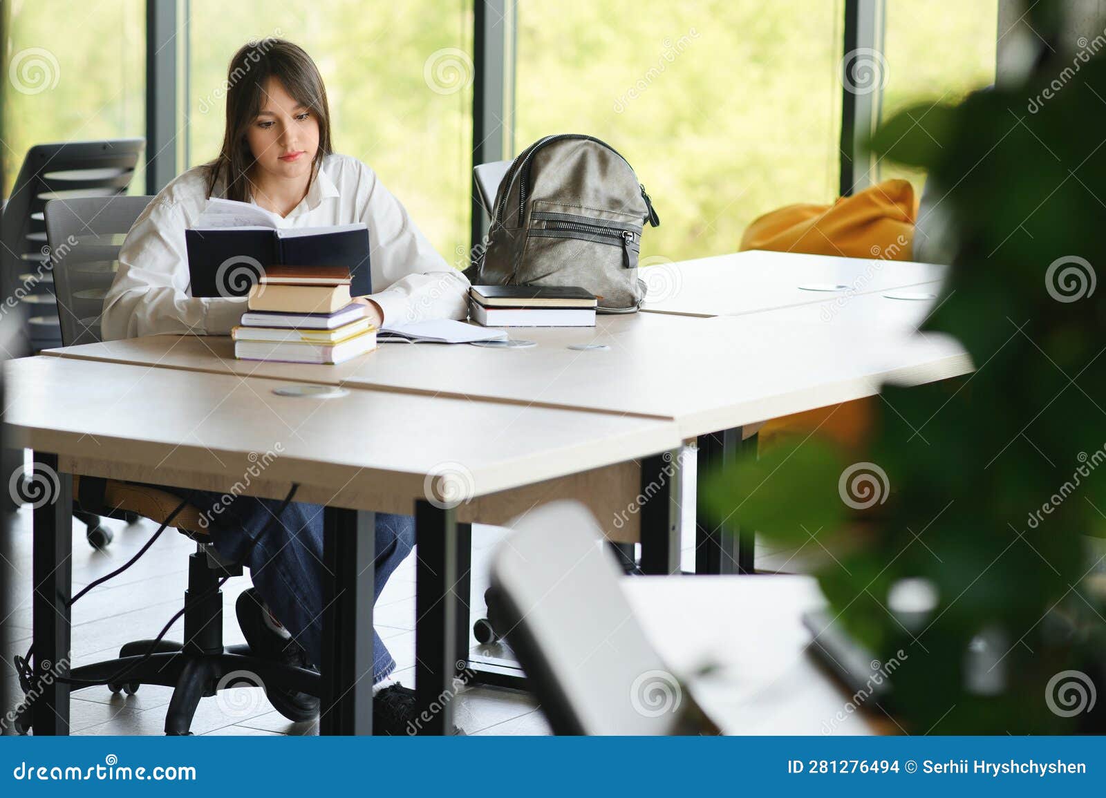 Girl at the desk in school stock photo. Image of beautiful - 281276494