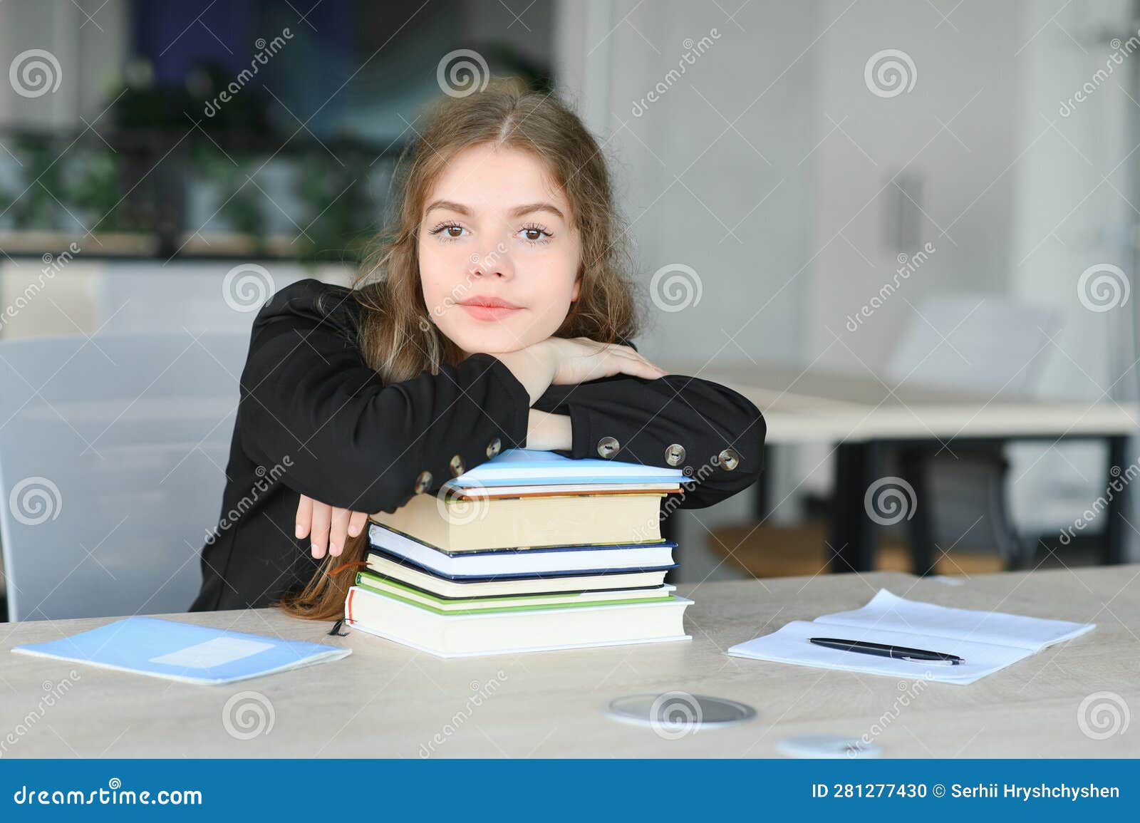 Girl at the desk in school stock photo. Image of caucasian - 281277430