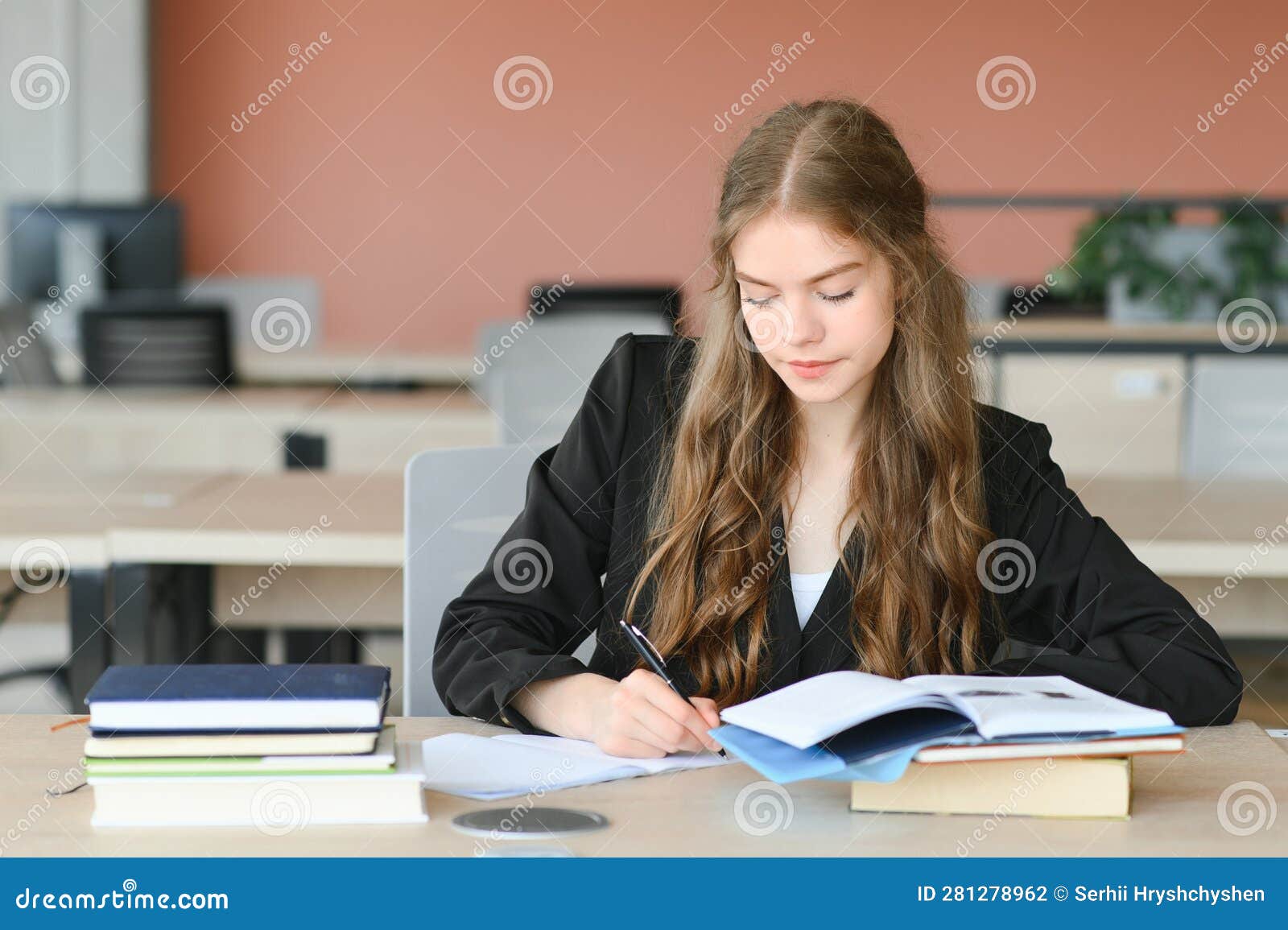Girl at the desk in school stock photo. Image of young - 281278962