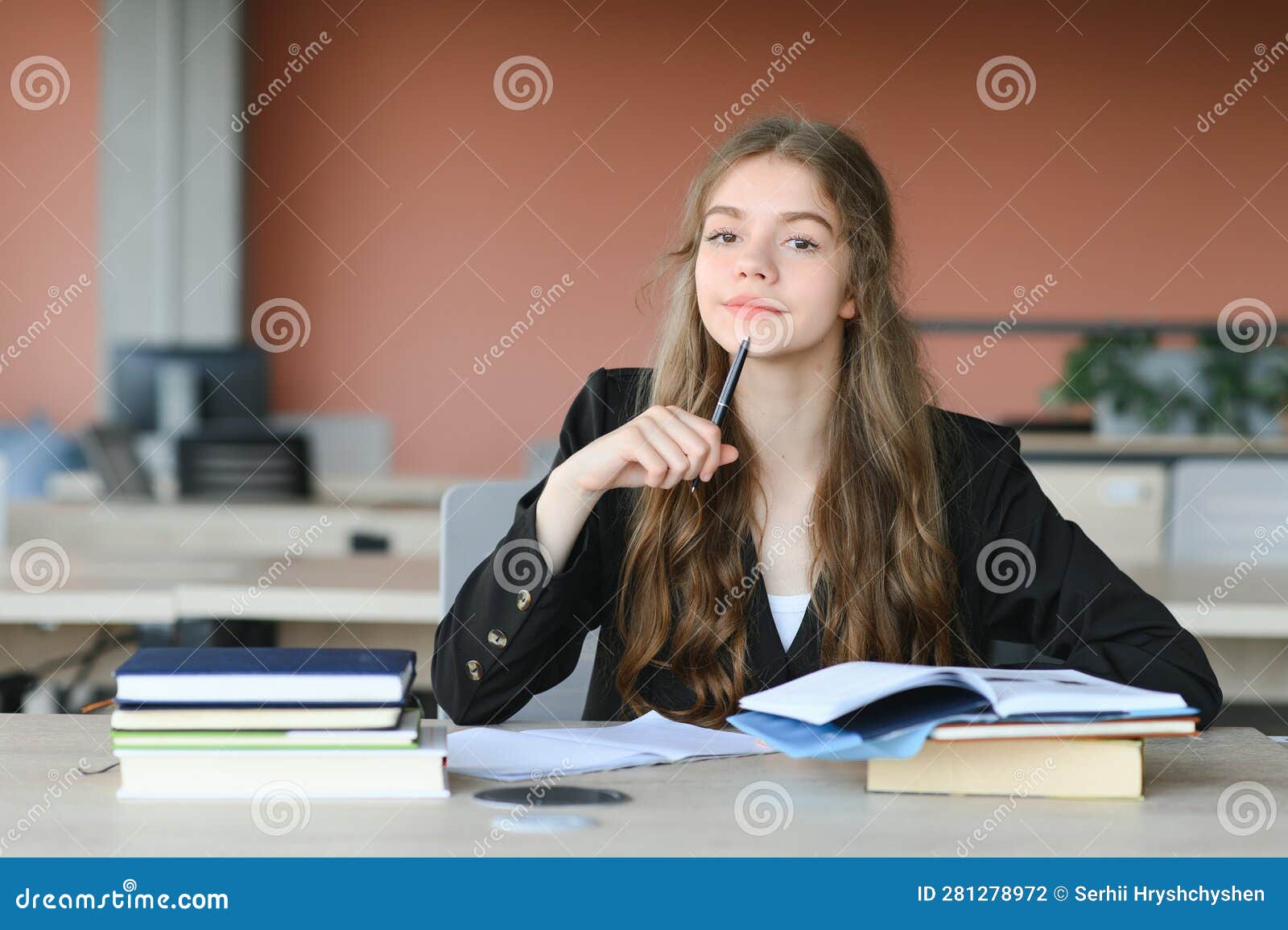 Girl at the desk in school stock photo. Image of young - 281278972