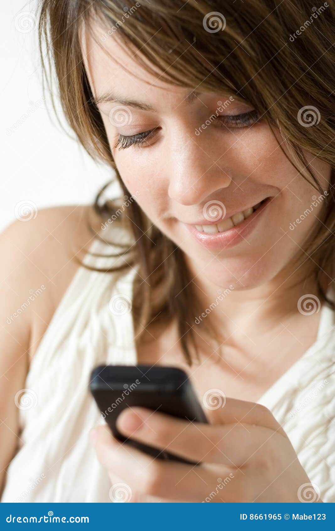Girl dialing cellphone stock image. Image of looks, female - 8661965