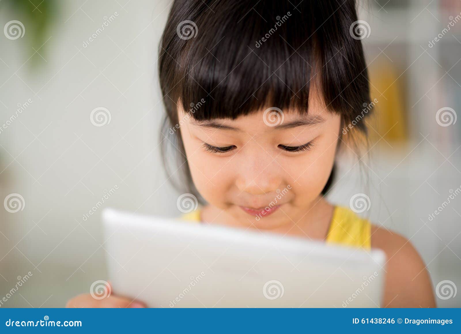 Girl with digital tablet stock photo. Image of watching - 61438246