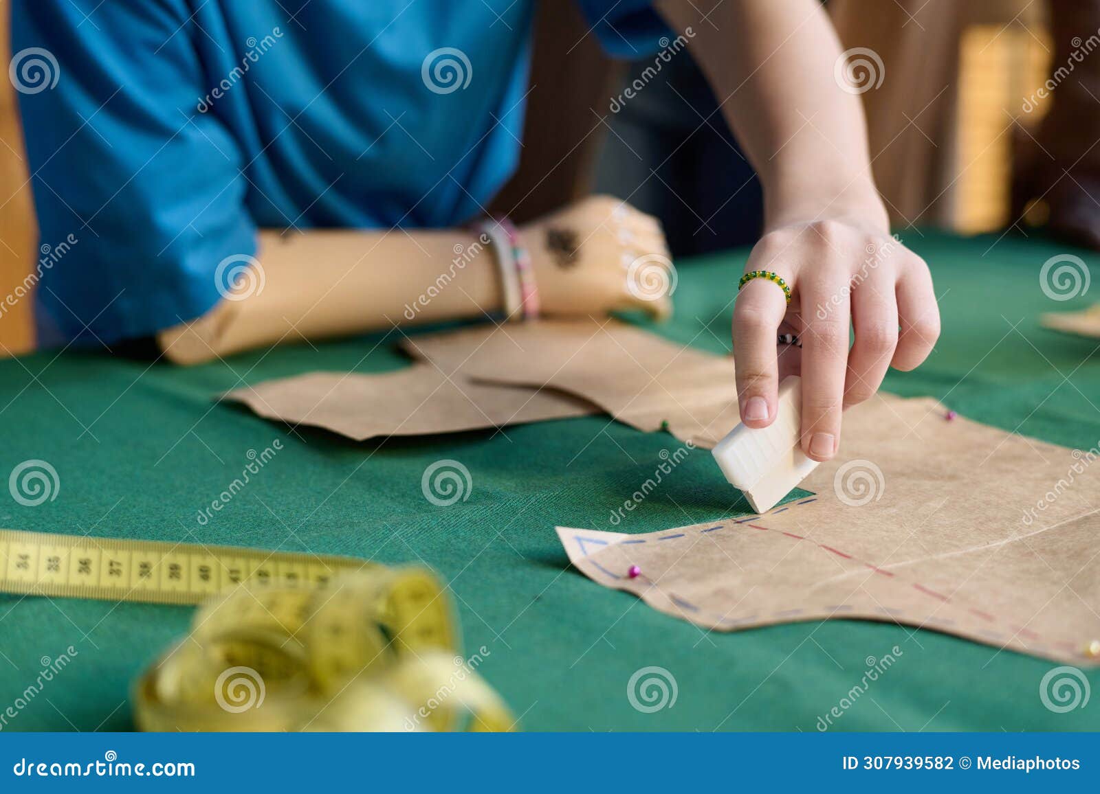 Girl with Disability Tracing Patterns in Sewing Class Stock Photo ...