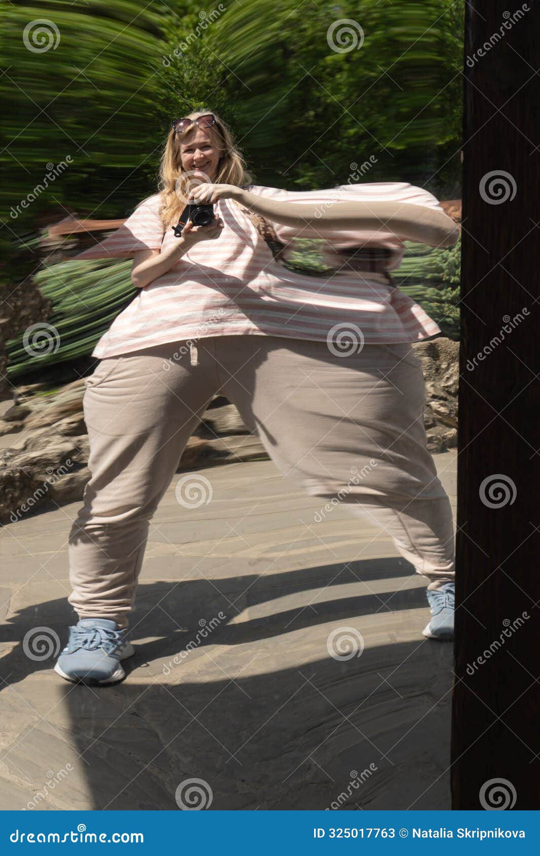 Girl in a distorted mirror stock image. Image of female - 325017763