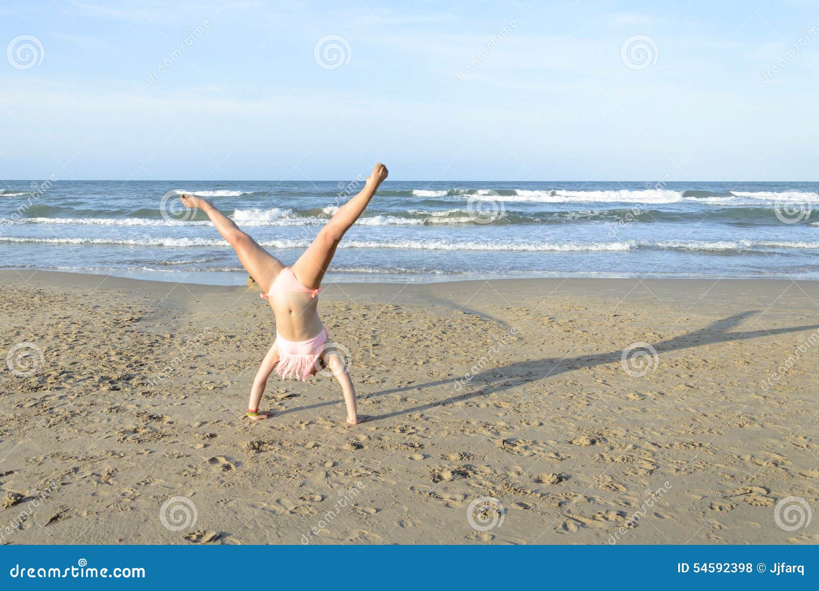Girl Doing Cartwheel on the Beach Stock Photo - Image of mediterranean ... Girl Doing Cartwheel on the Beach Stock Photo - Image of mediterranean ...