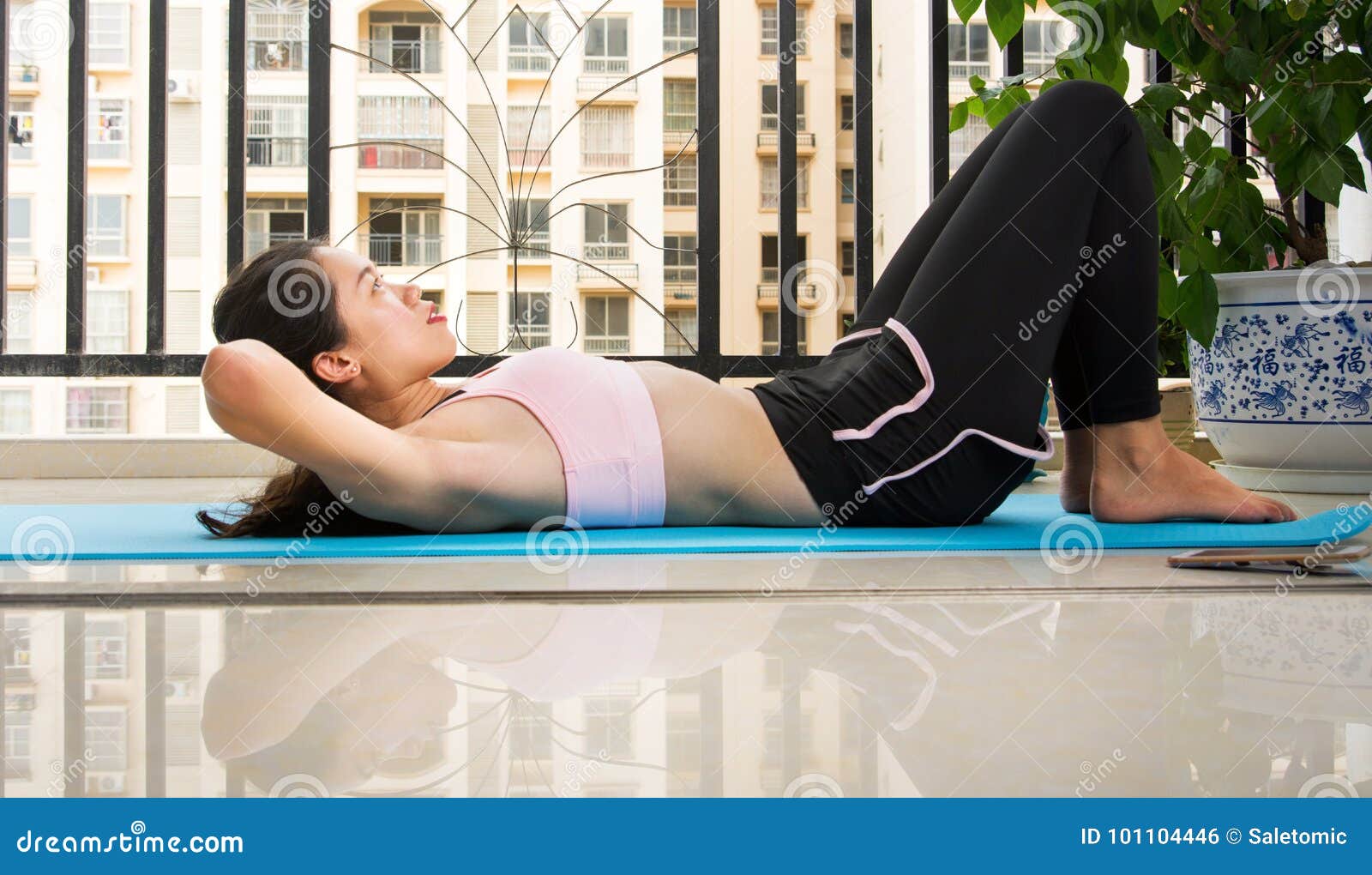 Girl Doing Crunches on the Balcony Stock Photo - Image of concept ...