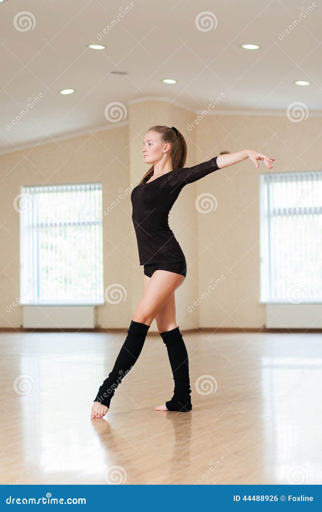 Girl Doing Exercises in a Dance Class Stock Photo - Image of ballet ...