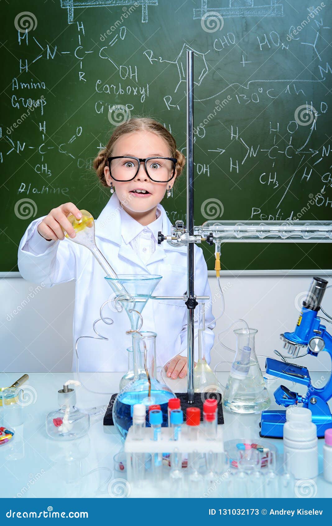 Girl doing experiments stock image. Image of emotional - 131032173