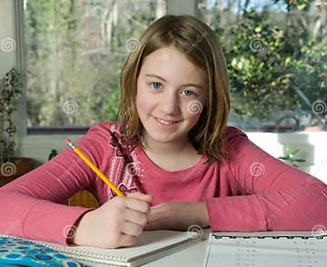 Girl doing homework stock image. Image of math, achievement - 13086367