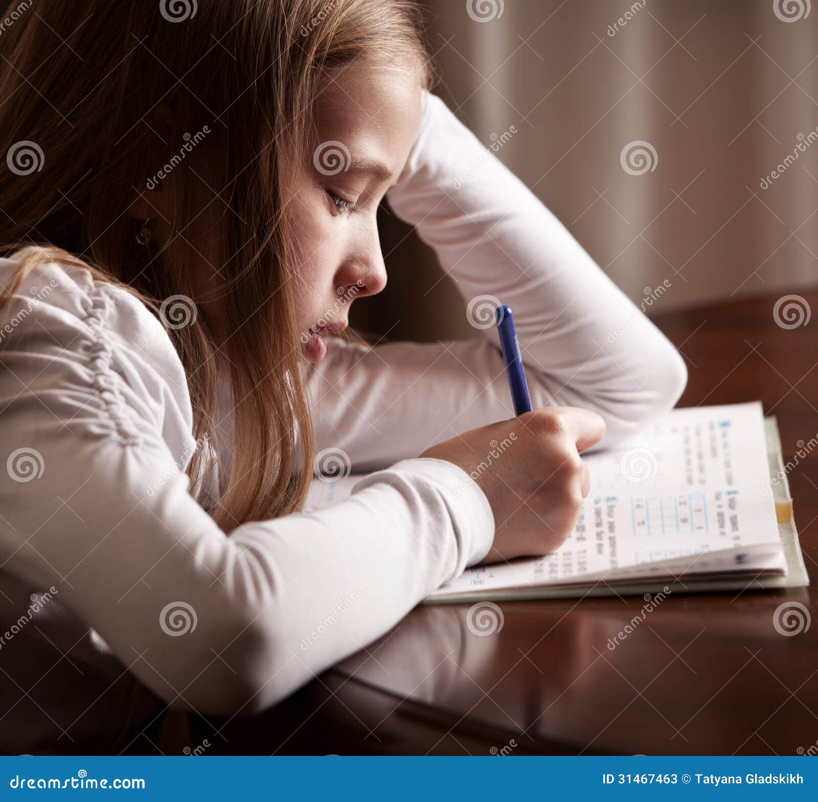 Sad Girl Writing A Letter