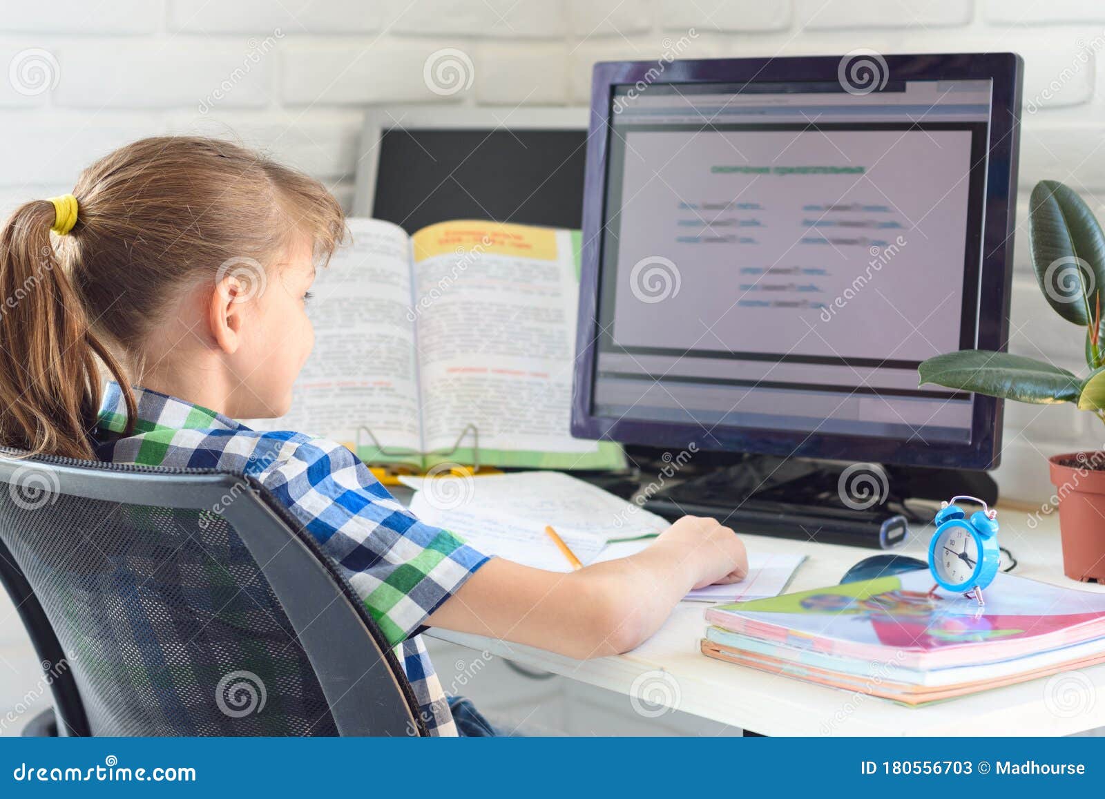 Girl Doing Homework on the Computer at Home Stock Image - Image of ...